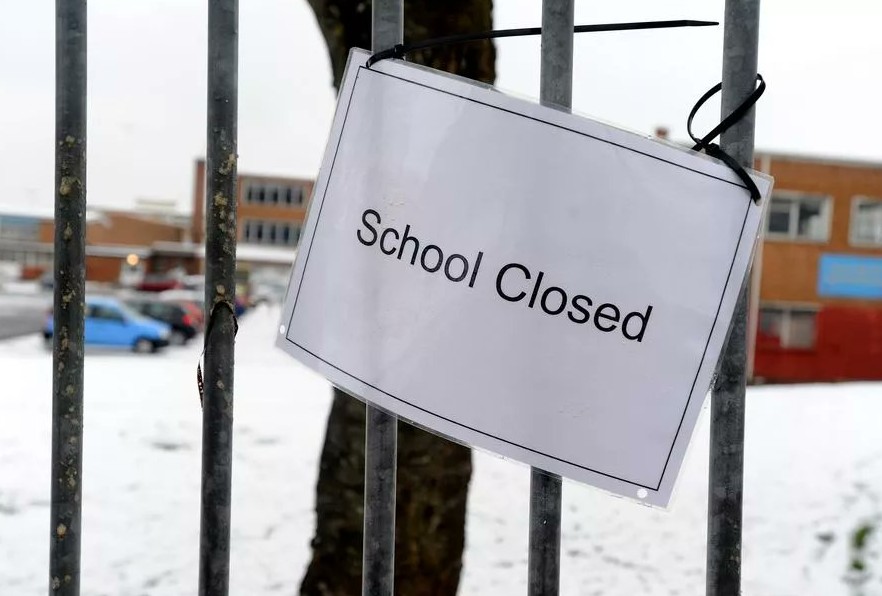 School closures today as snow and ice hit the UK